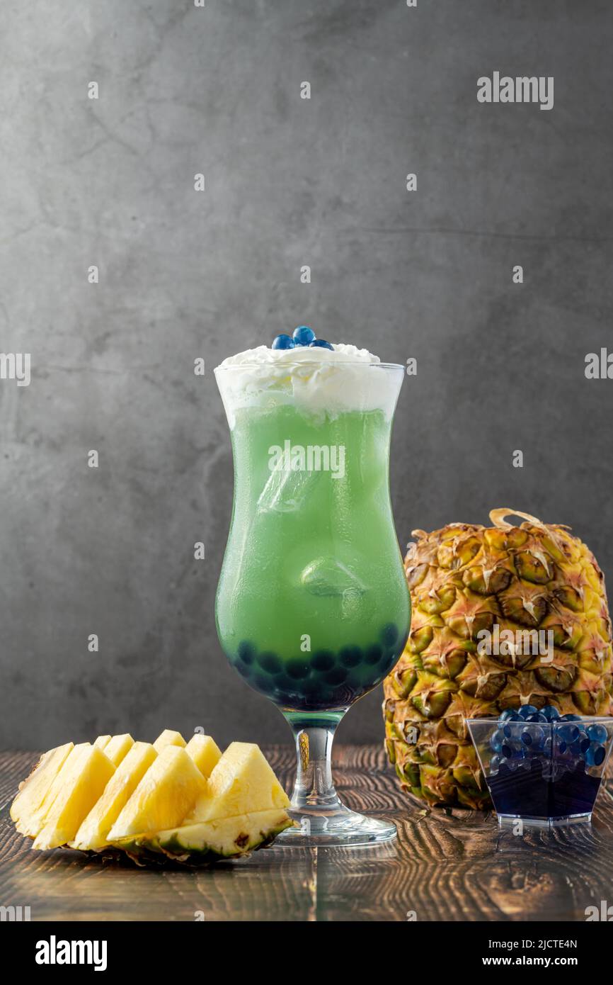 Fruity Bubble Tea in glass cup on dark background Stock Photo - Alamy