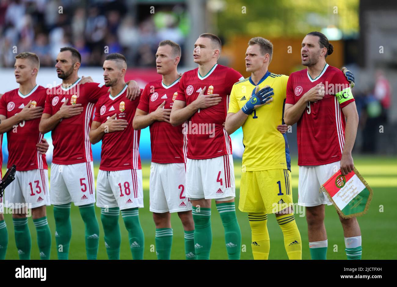 Hungary captain Adam Szalai (right) and team-mates line up before the ...
