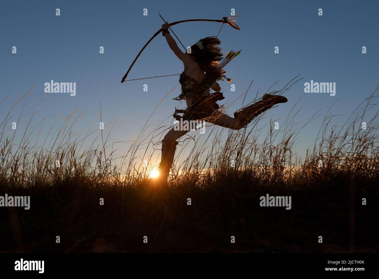 An Native American Indian girl is seen running and charging through the ...