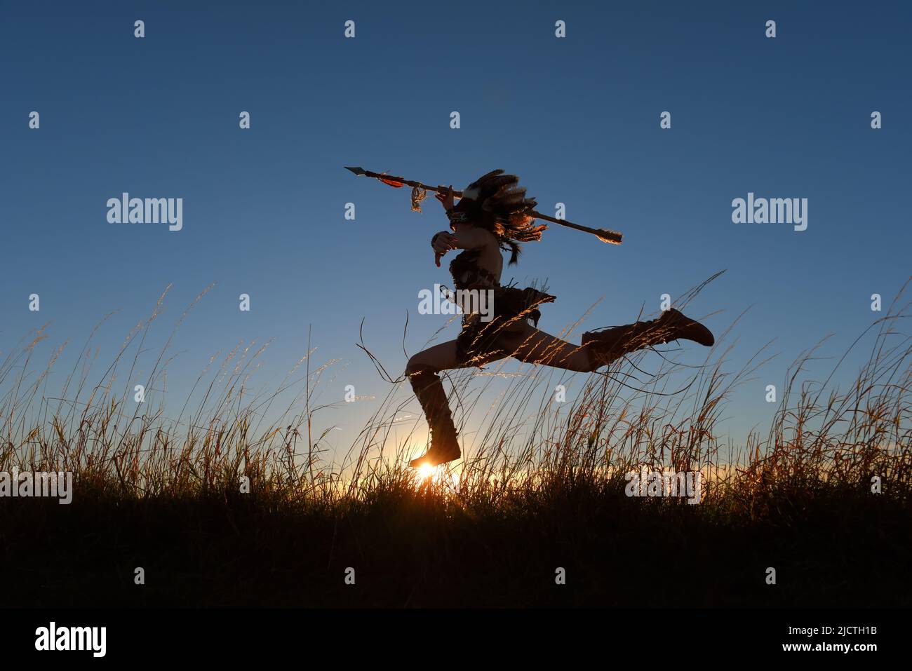 An Native American Indian girl is seen running and charging through the ...