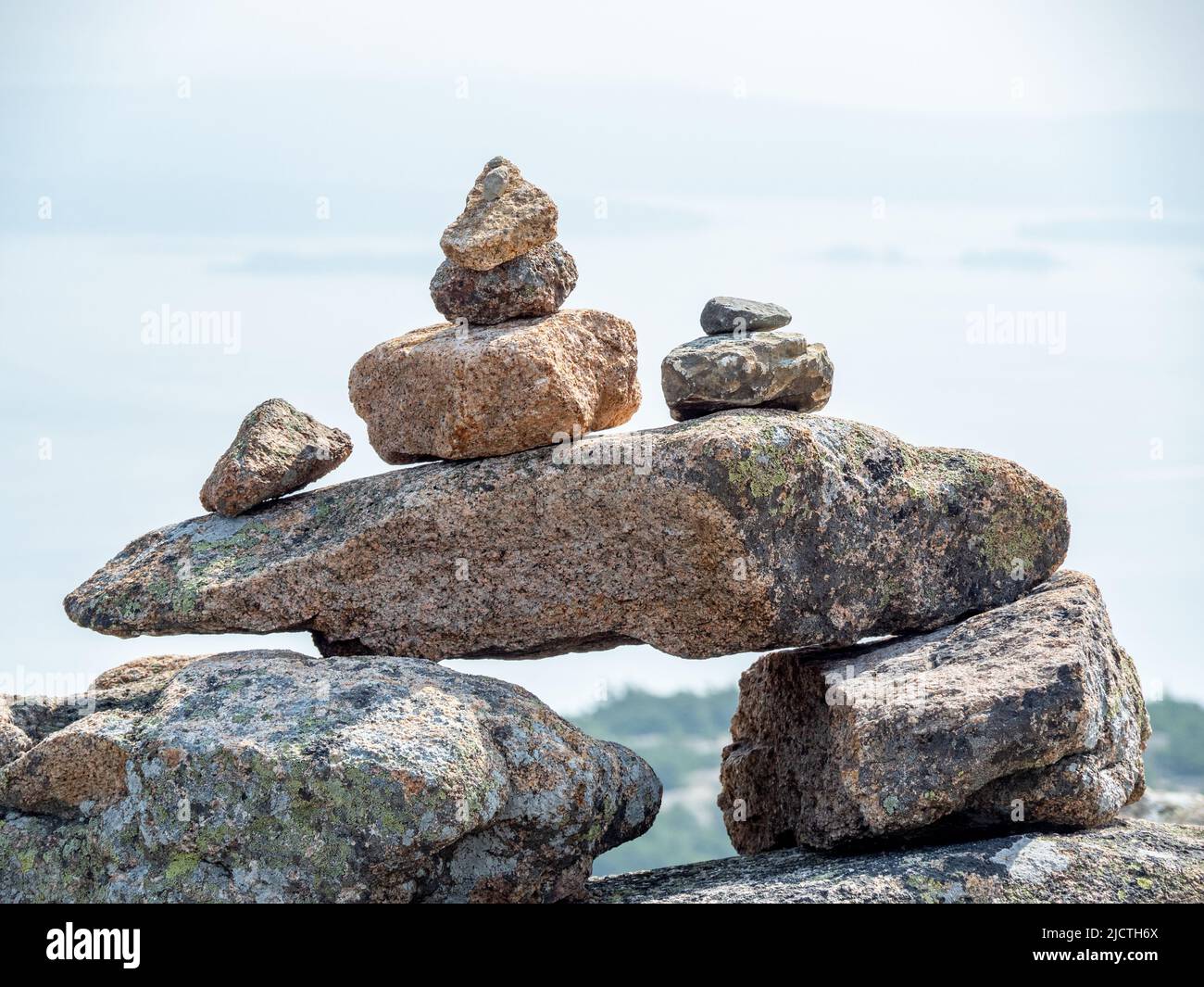 Stacked stones forming cairn with copy space guide hikers along the ...