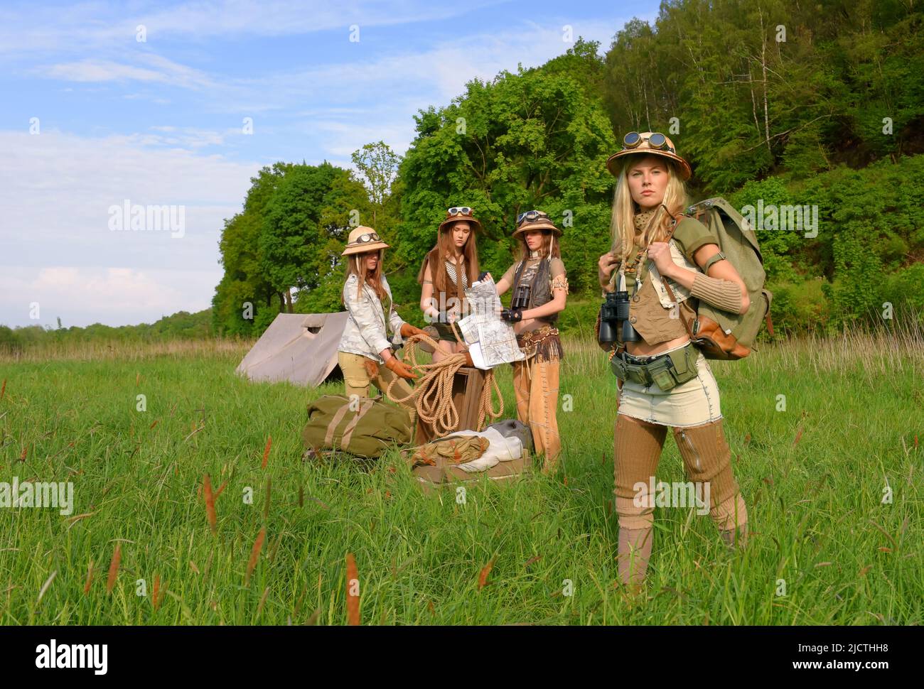 Four girls are seen as explorers.They set up a campsite in the outdoor ...
