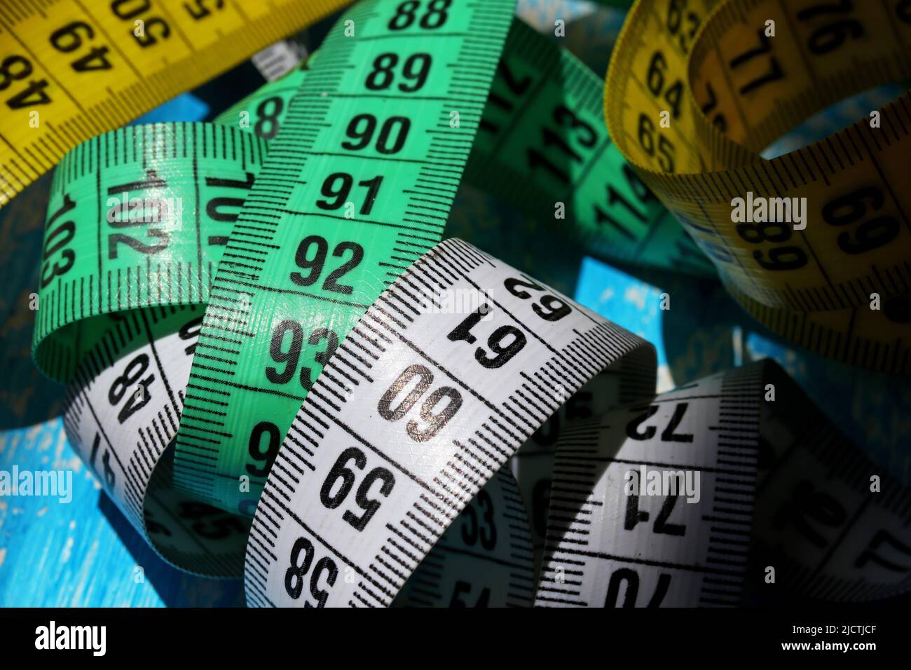 Close up colorful measuring tape detail Stock Photo - Alamy