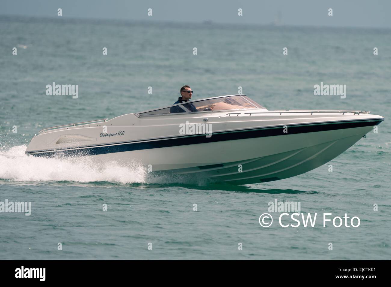 Speed Boat in sea Sandbanks Stock Photo - Alamy