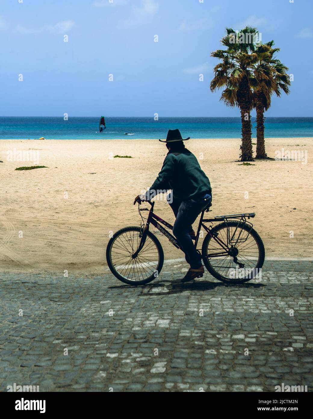 Riding bike on beach hi-res stock photography and images - Alamy