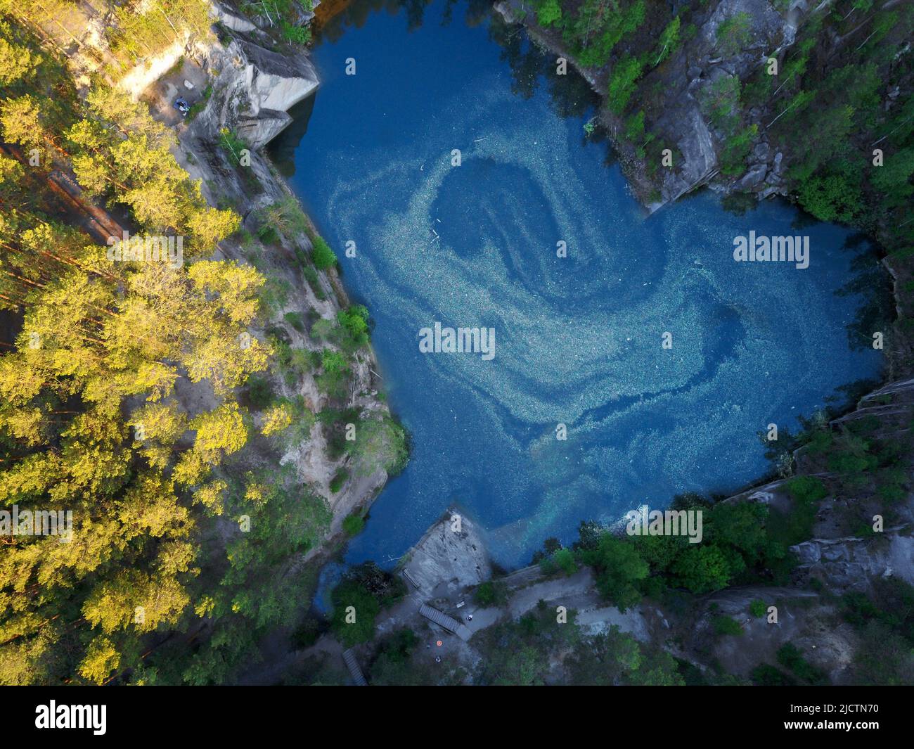 a heart-shaped lake in the mountains.photo from a bird's eye view Stock ...