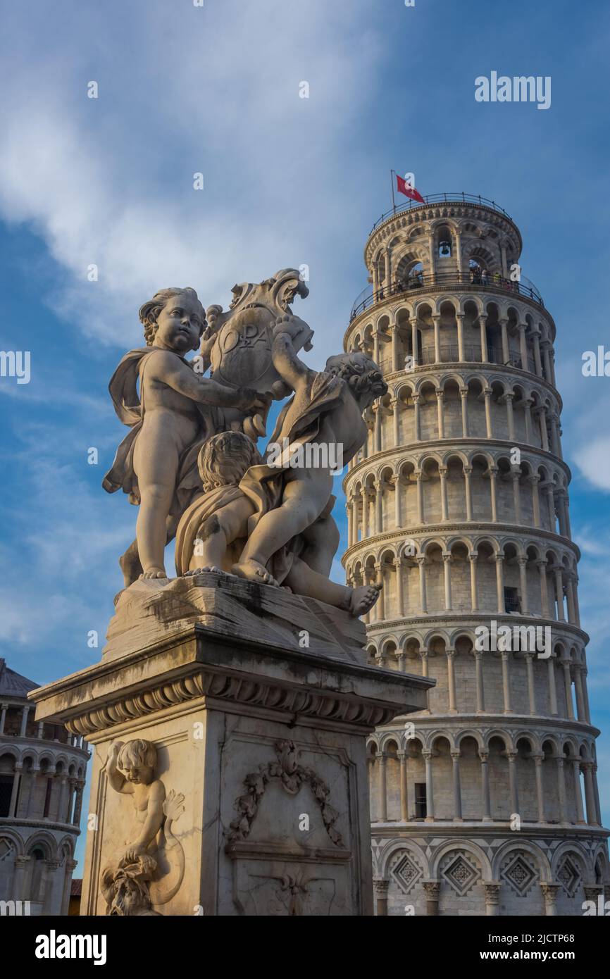Classical statue in front of the Leaning Tower of Pisa, Italy Stock ...