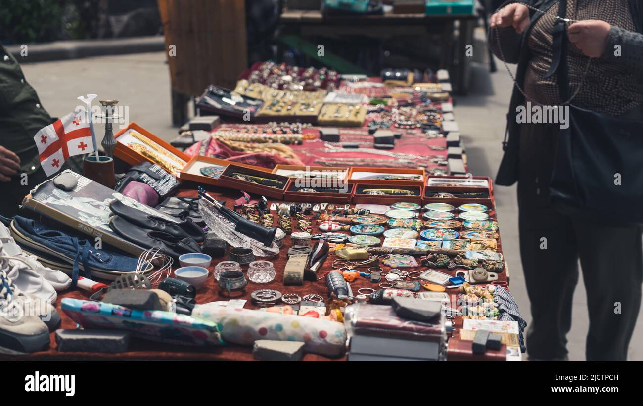 counter of old vintage things and Georgian souvenirs, flea market ...