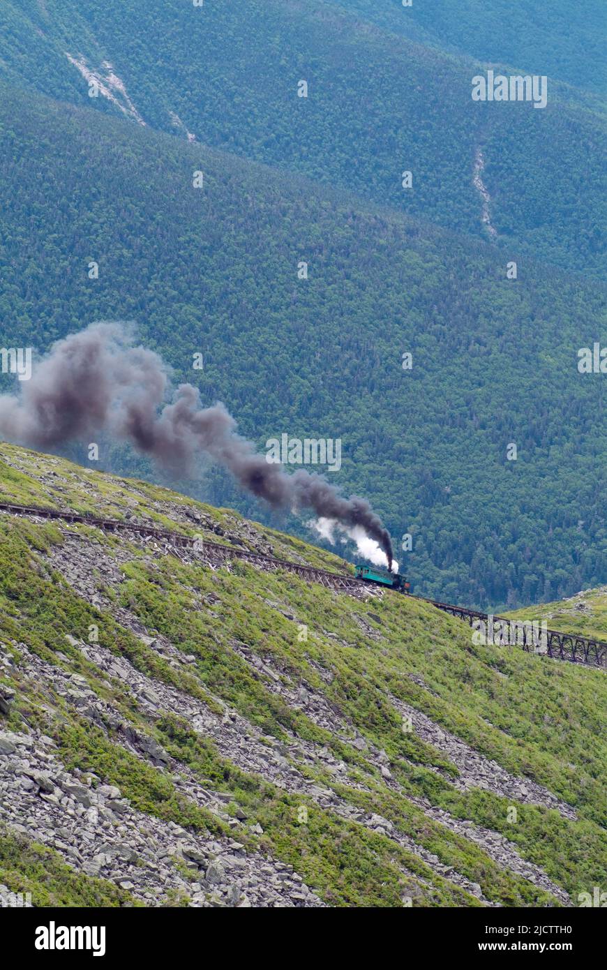 The Cog Railroad passenger train on Mount Washington in the White ...