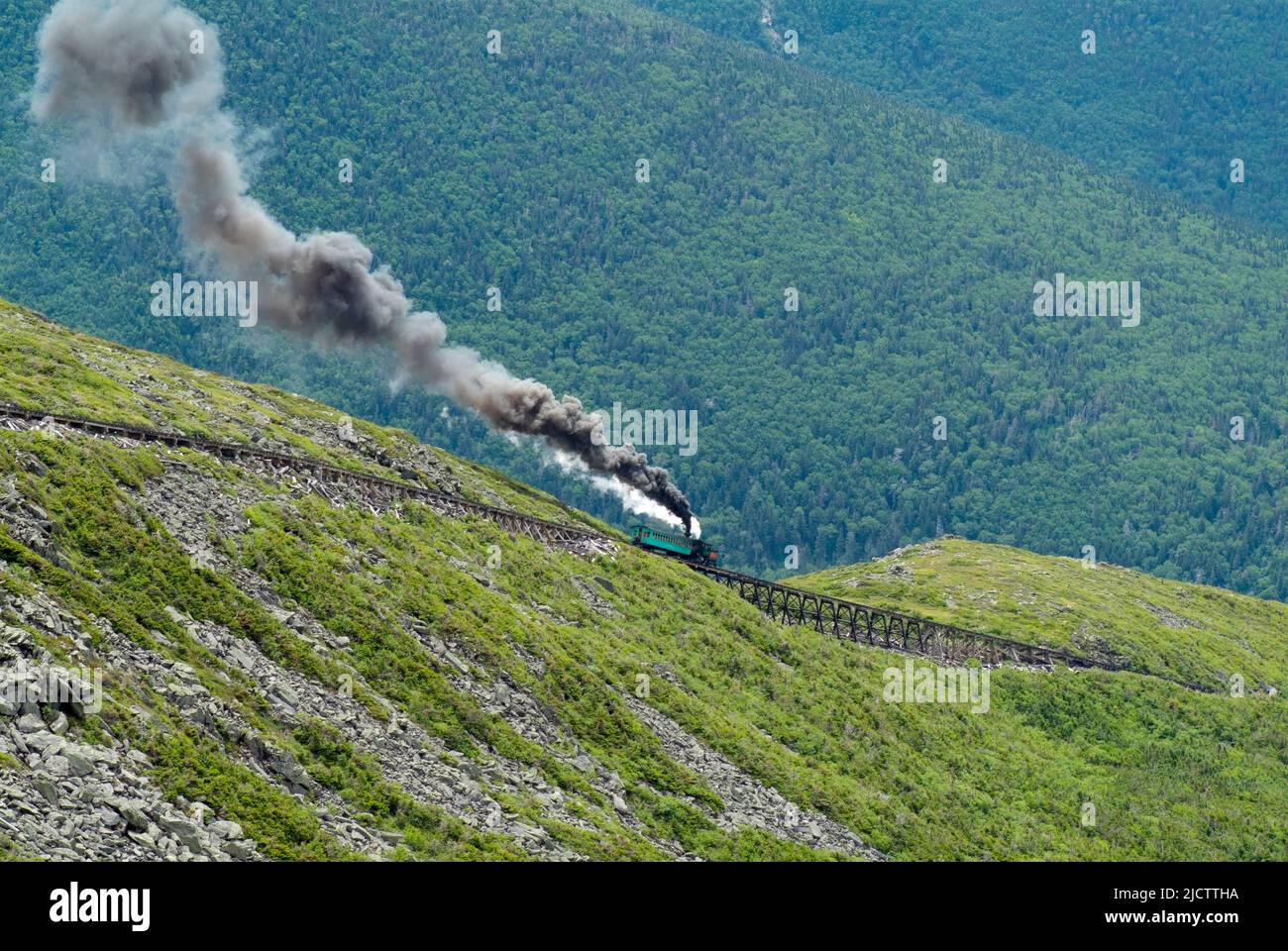 The Cog Railroad passenger train on Mount Washington in the White ...