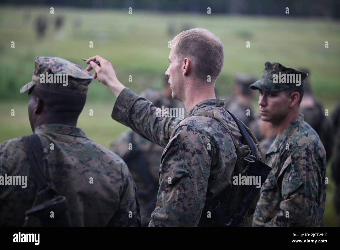 U.S. Marines with Charlie Company, 1st Battalion, 8th Marine Regiment (1/8), 2D Marine Division ...