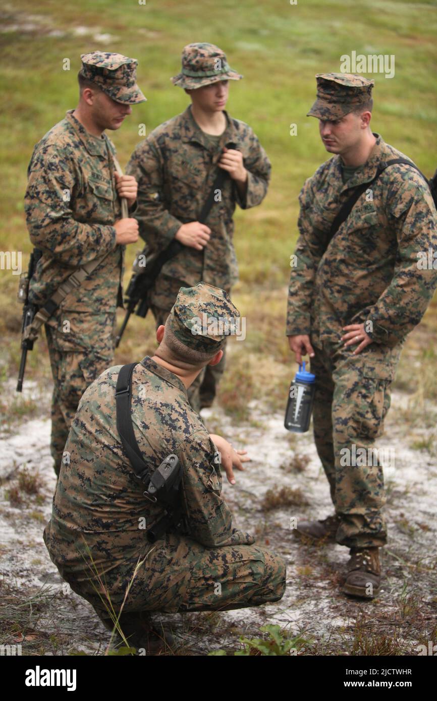 U.S. Marines with Charlie Company, 1st Battalion, 8th Marine Regiment (1/8), 2D Marine Division ...