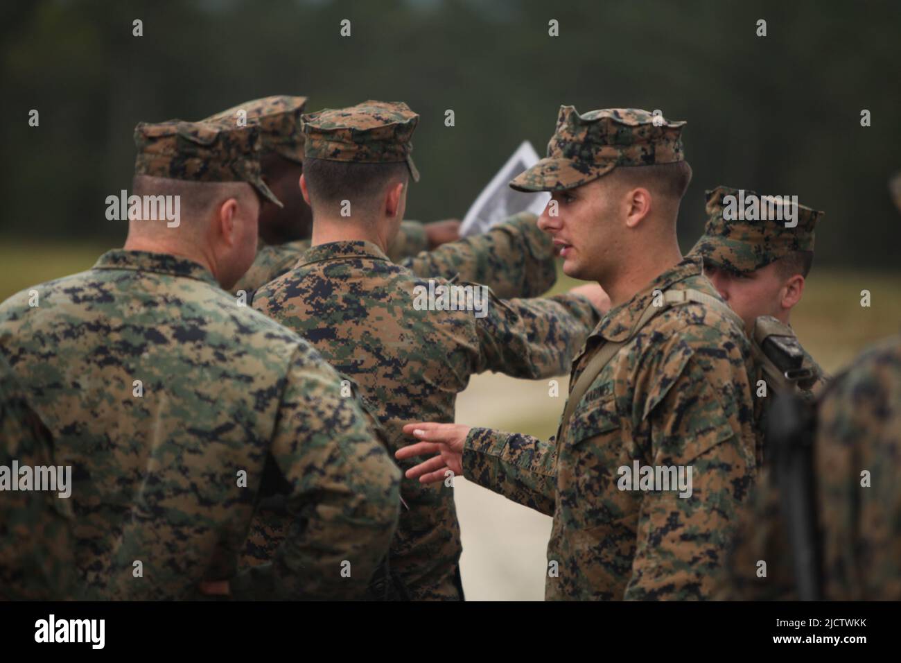 U.S. Marines with Charlie Company, 1st Battalion, 8th Marine Regiment (1/8), 2D Marine Division ...