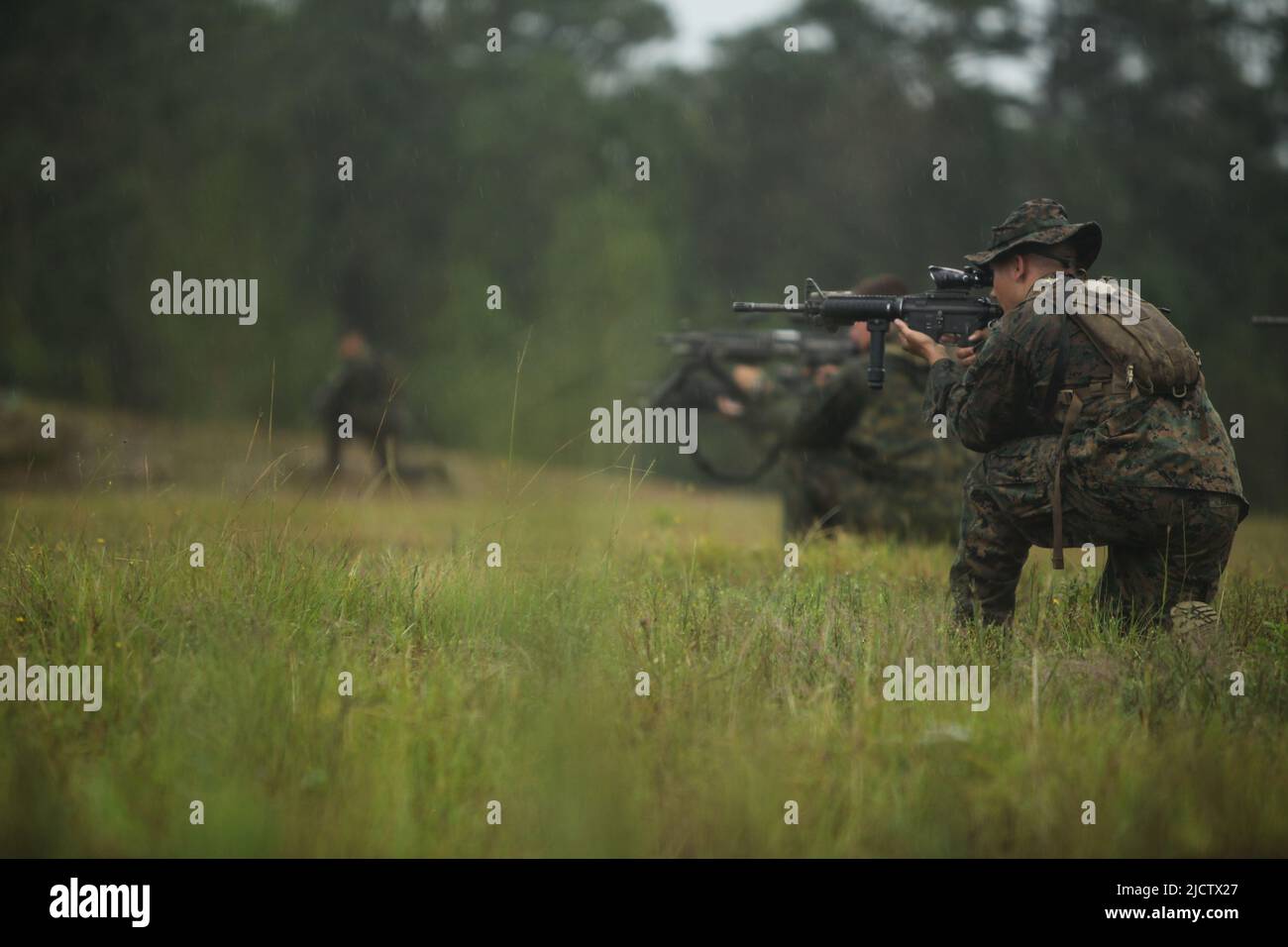 U.S. Marines with Charlie Company, 1st Battalion, 8th Marine Regiment (1/8), 2D Marine Division ...