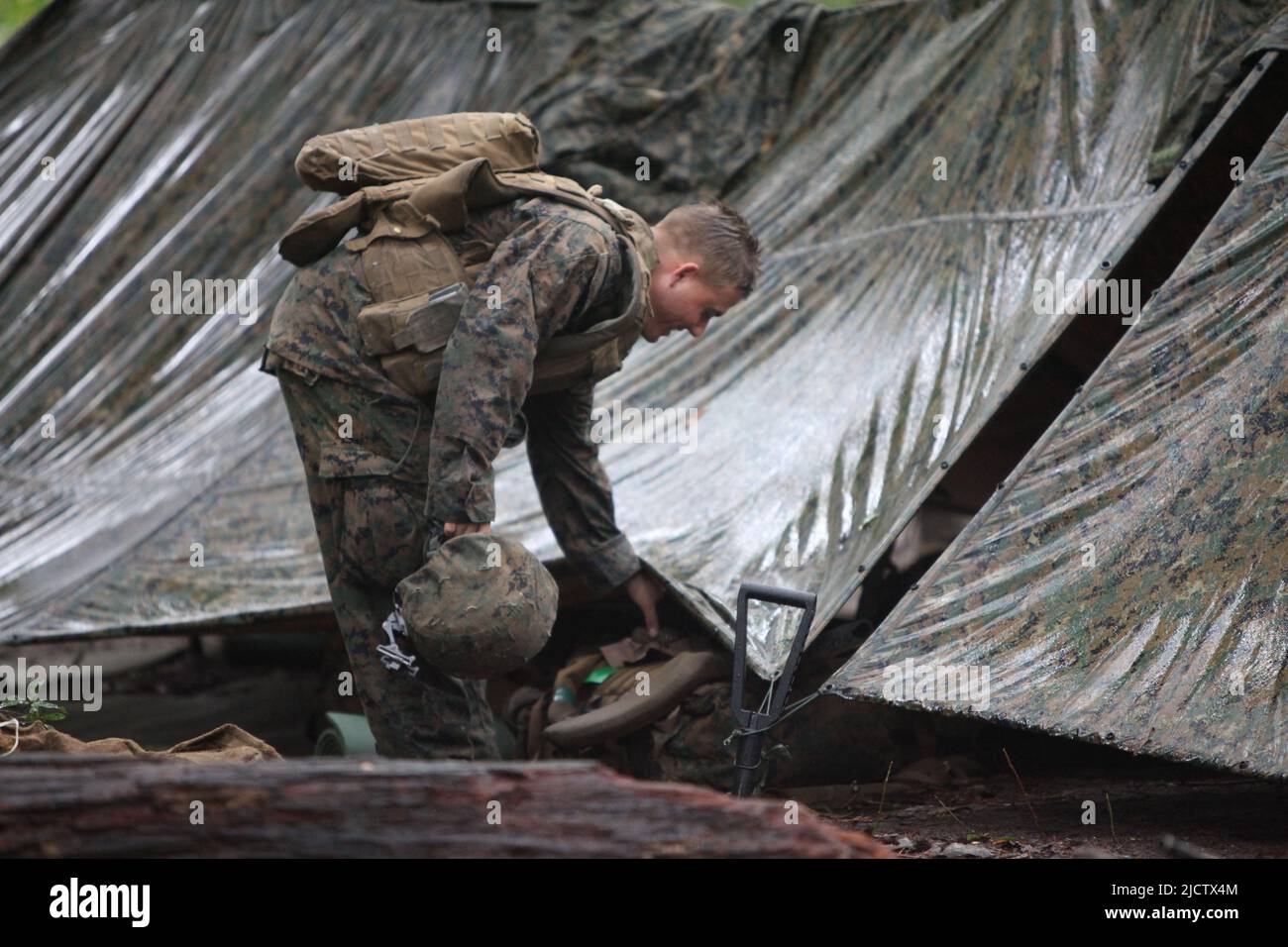 A U.S. Marine with Charlie Company, 1st Battalion, 8th Marine Regiment ...