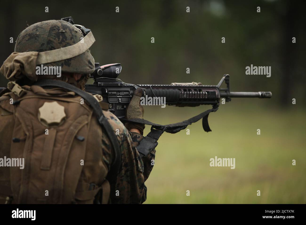 A U.S. Marine with Charlie Company, 1st Battalion, 8th Marine Regiment ...