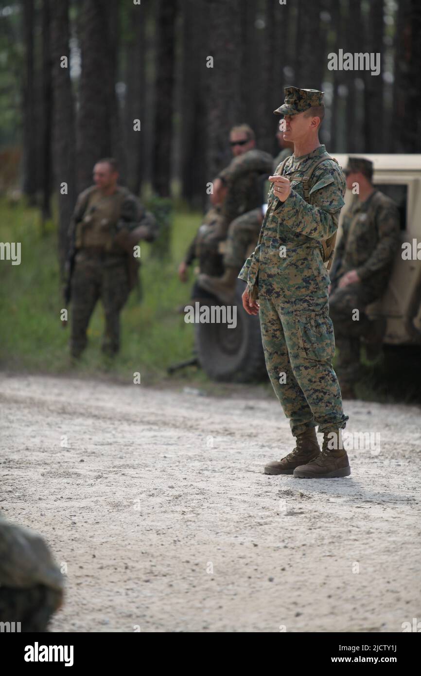 U.S. Marine Corps Captain Ryan R. Gordien, Commanding Officer with ...
