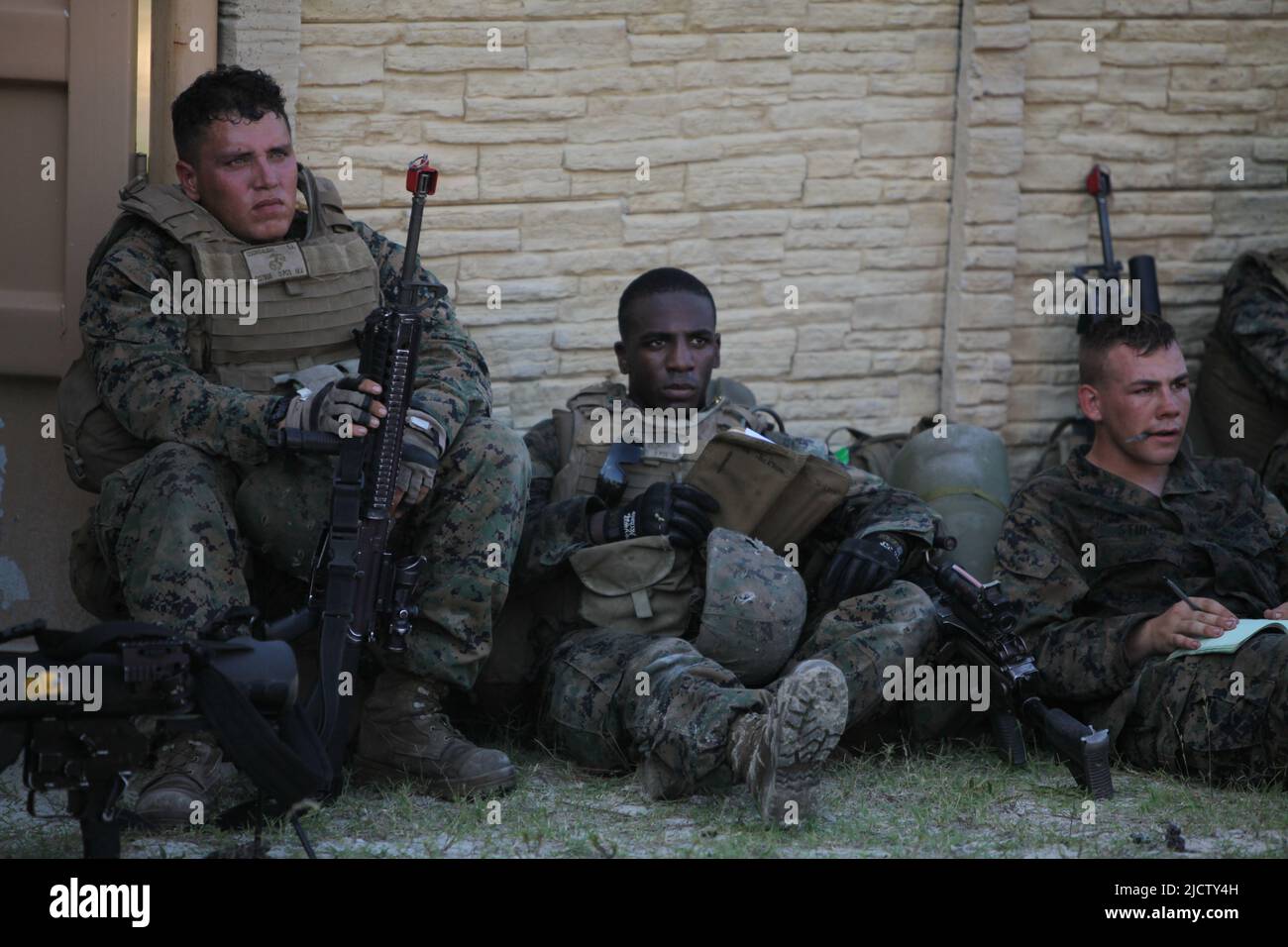 U.S. Marines with Charlie Company, 1st Battalion, 8th Marine Regiment (1/8), 2D Marine Division ...