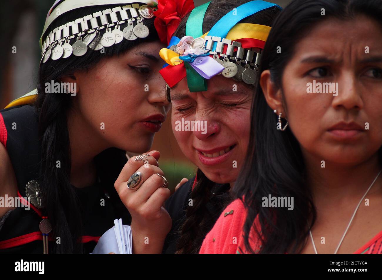 A Mapuche indian girl crying when hundred indigenous women from 20 ...