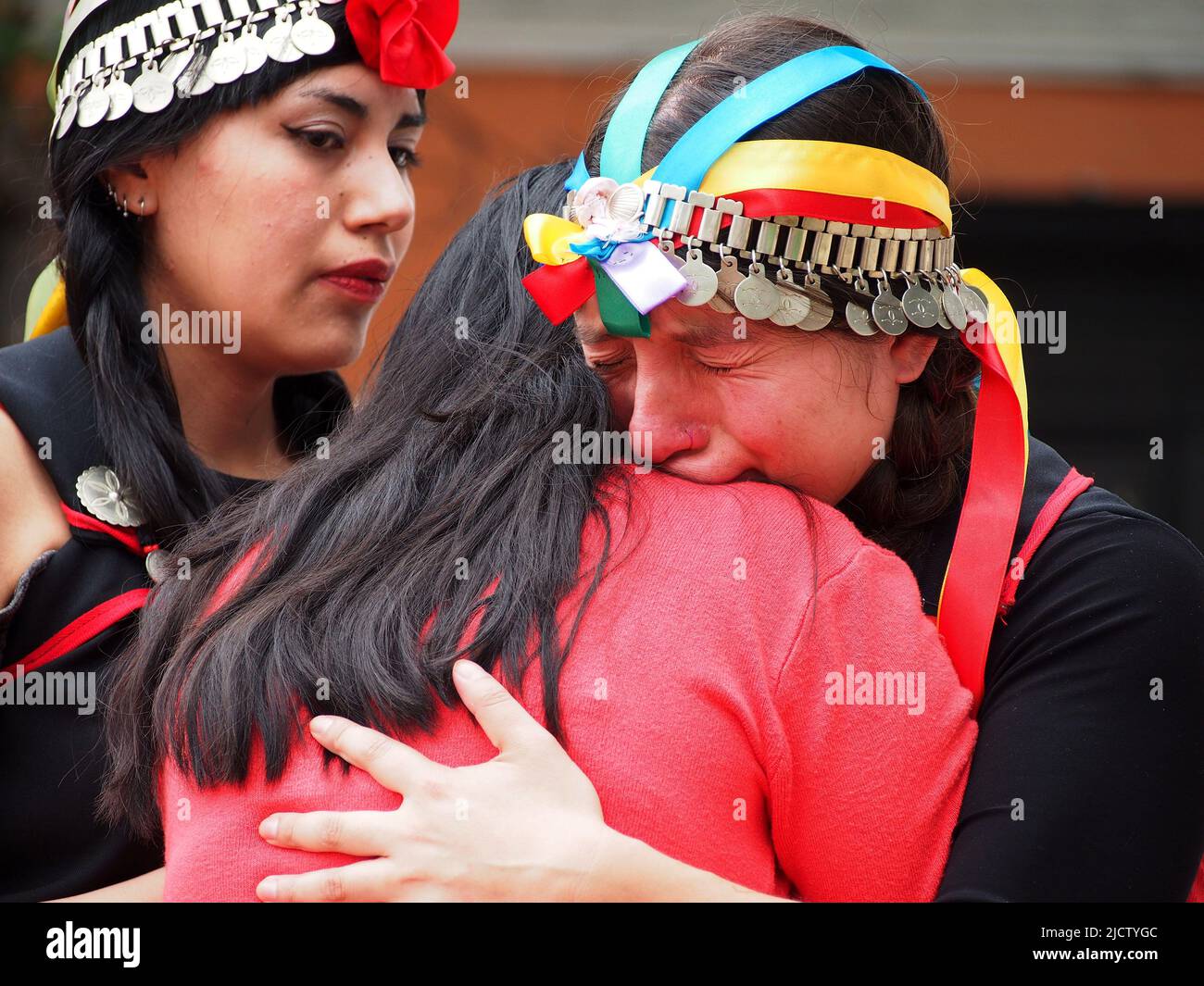 A Mapuche indian girl crying when hundred indigenous women from 20 ...