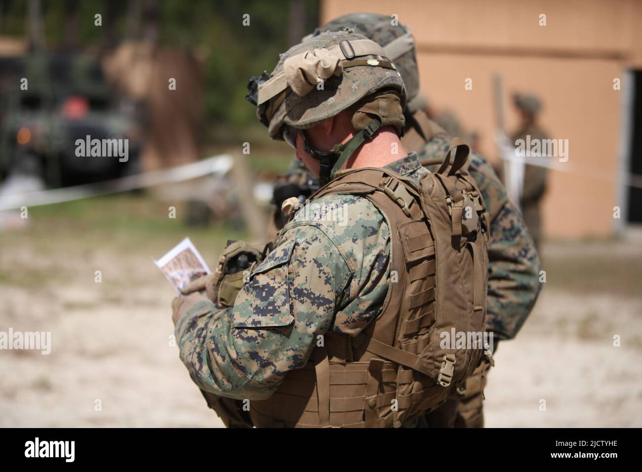U.S. Marines with Charlie Company, 1st Battalion, 8th Marine Regiment (1/8), 2D Marine Division ...