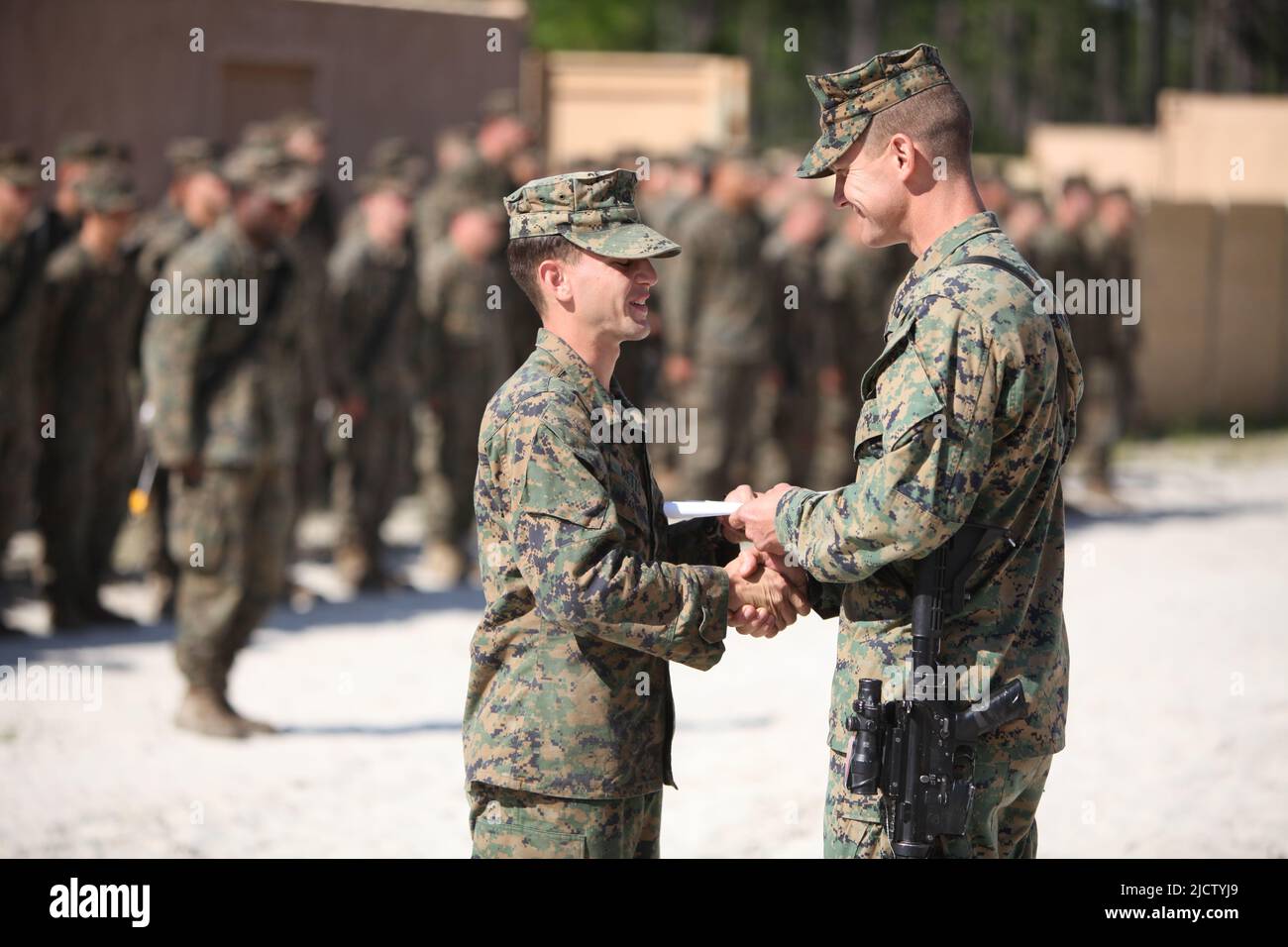 U.S. Marine Corps Corporal Christopher Metts (left) with Charlie ...