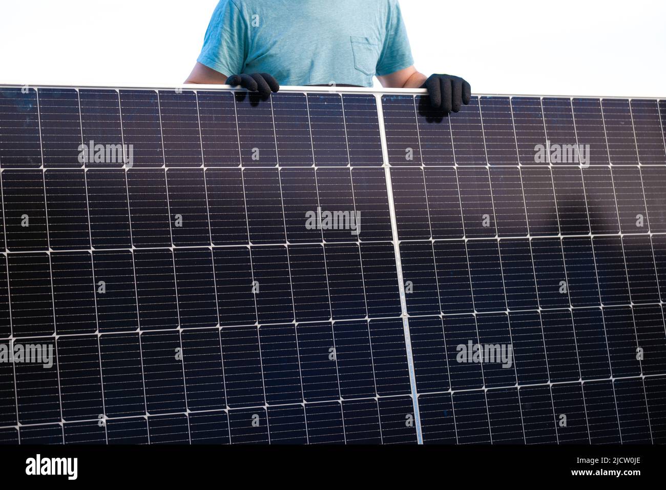 Solar energy.Green energy. Solar panel in the hands of a worker ...