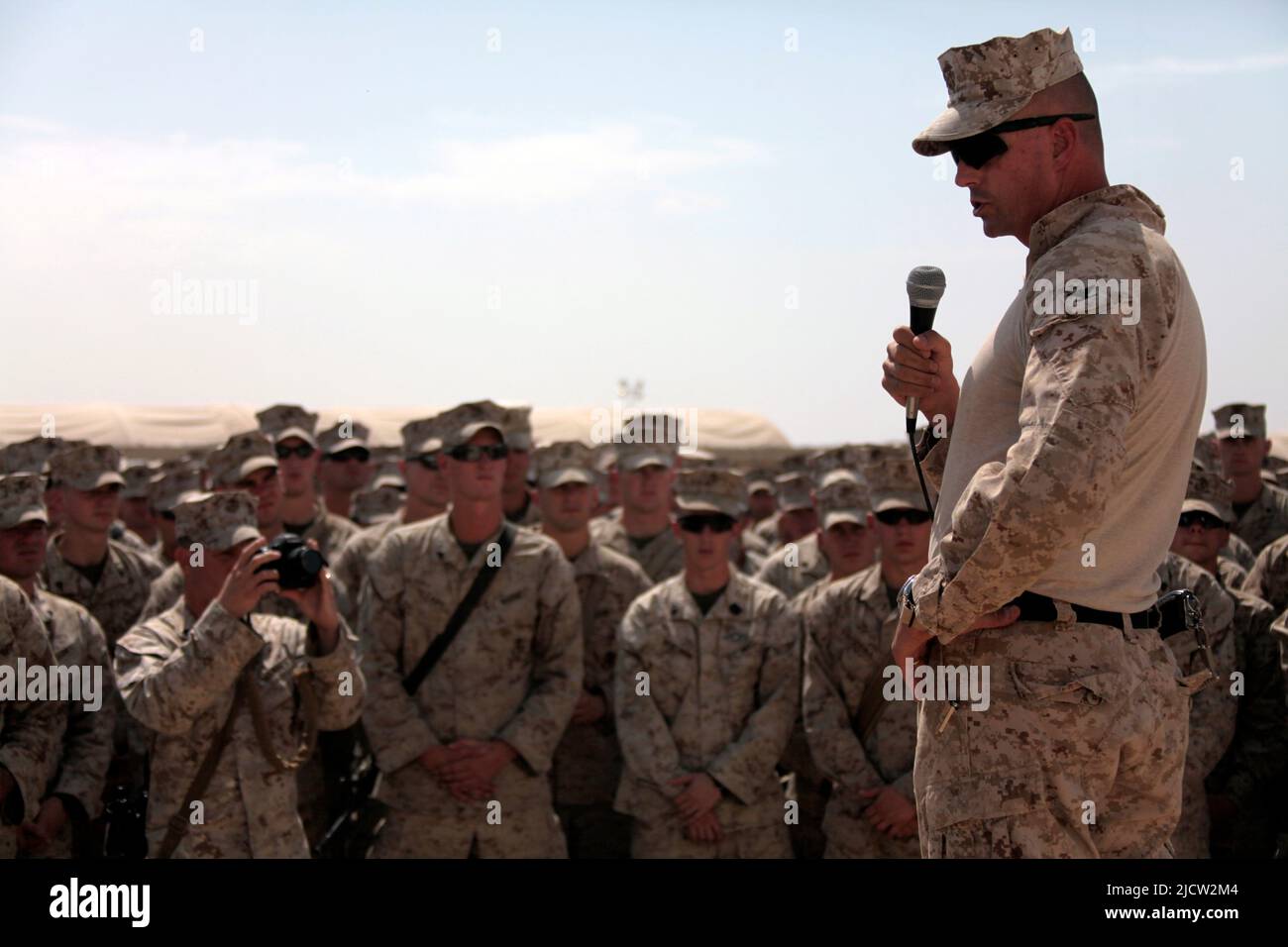 US Marine speaks to fellow Marines about completing their mission while ...