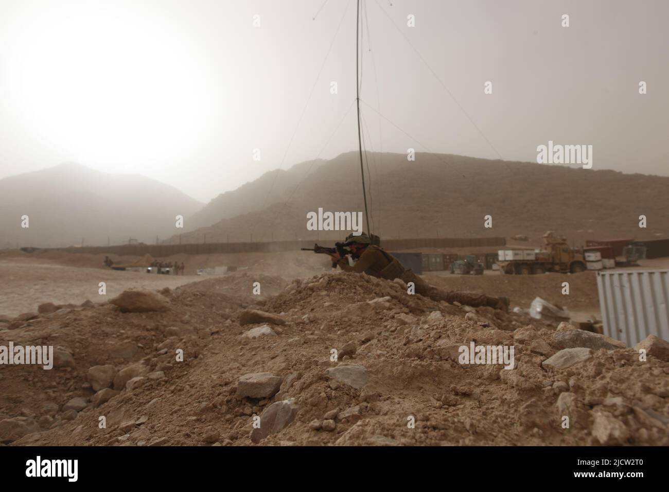 US Marines with 1st Battalion, 8th Marine Regiment return fire from ...
