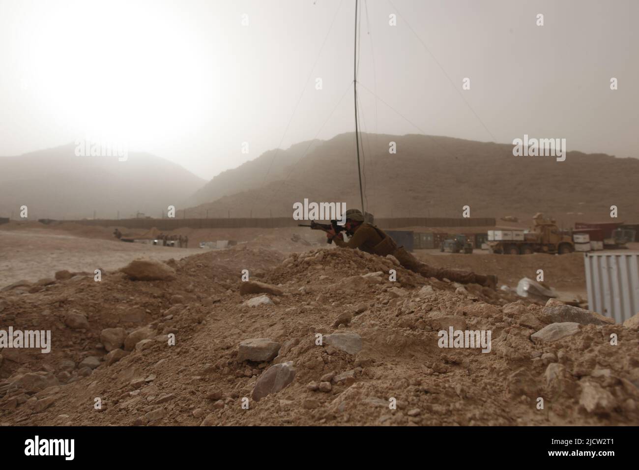 US Marines with 1st Battalion, 8th Marine Regiment return fire from ...
