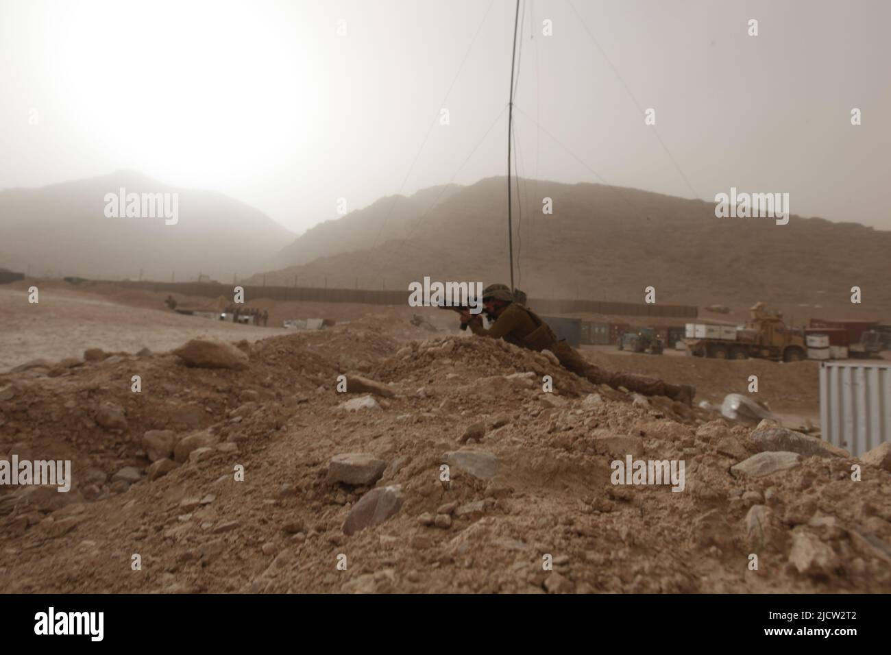 US Marines with 1st Battalion, 8th Marine Regiment return fire from ...