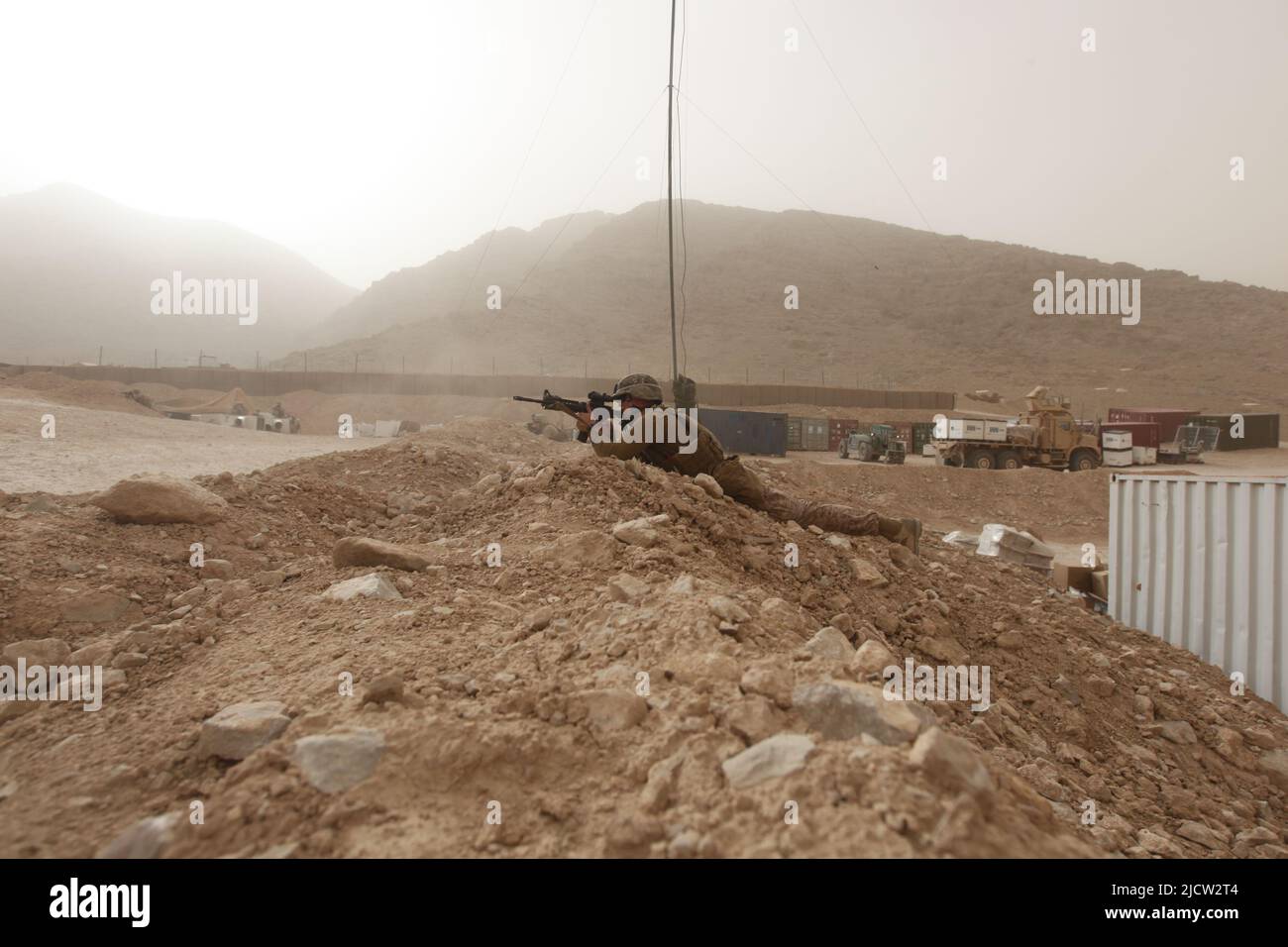 US Marines with 1st Battalion, 8th Marine Regiment return fire from ...