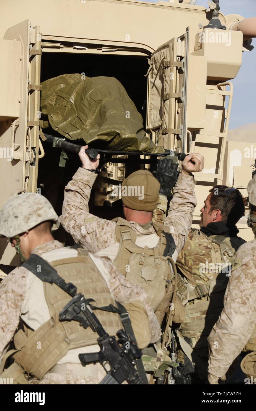 U.S. Marines alongside a U.S. Navy Hospital Corpsman, with 1st ...