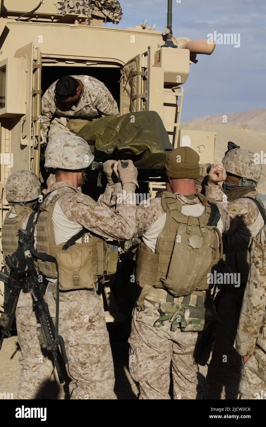 U.S. Marines alongside a U.S. Navy Hospital Corpsman, with 1st ...