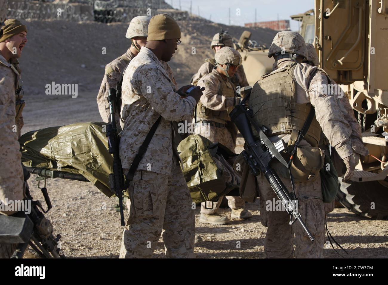 U.S. Marines alongside a U.S. Navy Hospital Corpsman, with 1st ...