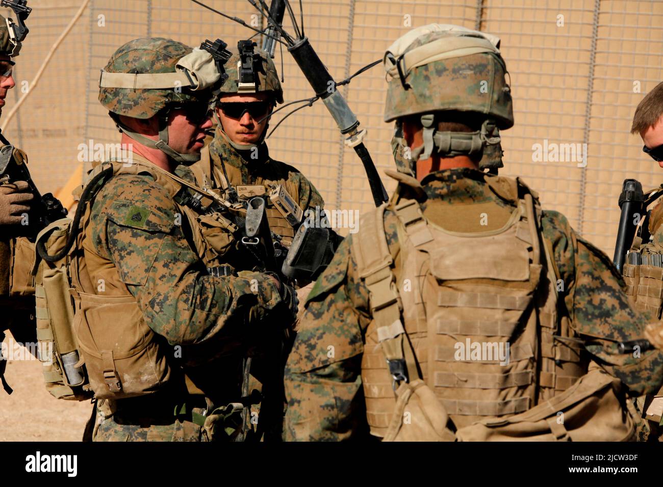 U.S. Marine Sgt. Phil Farmer (left) with Bravo Company, 1st Battalion, 8th Marine Regiment (1/8 ...