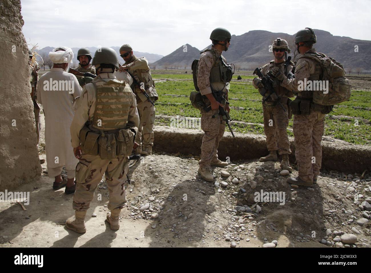 Afghan Task Force (ATF) soldiers with two British Royal Marines (right ...