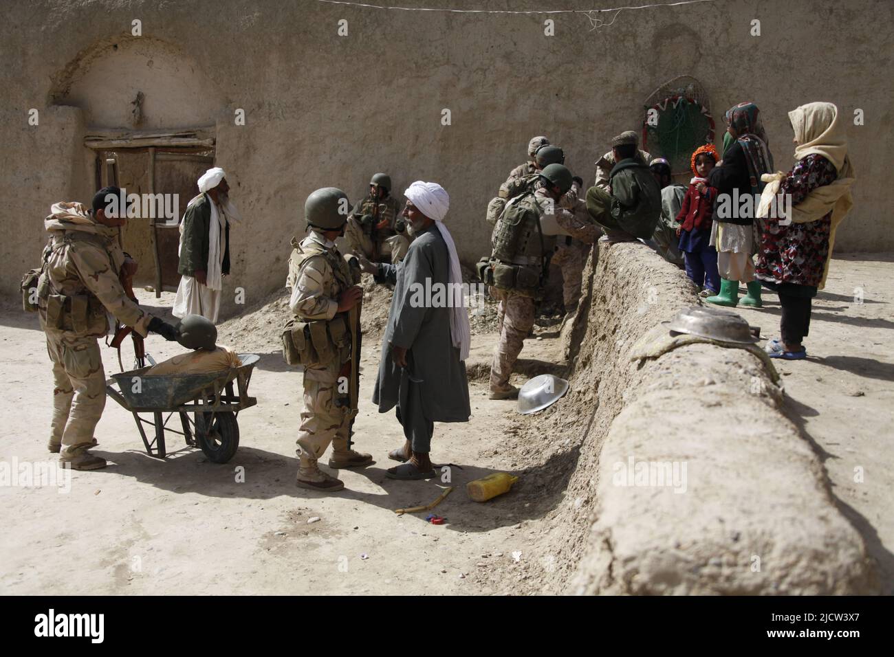 Afghan Task Force (ATF) soldiers question a compound owner about ...