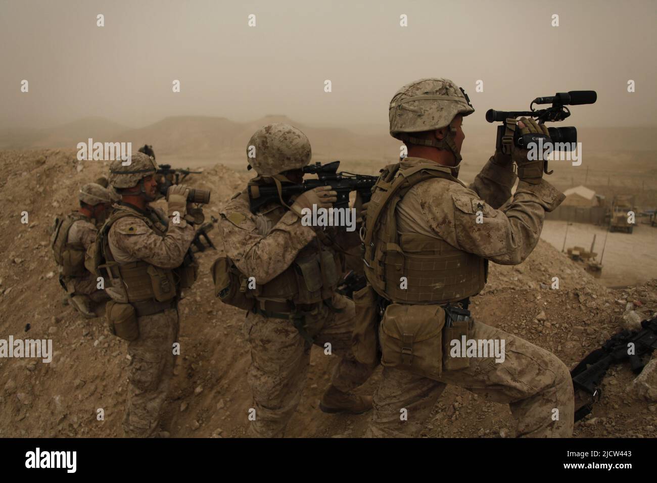U.S. Marine Corps Sgt. Albert J. Carls (right), Combat Cameraman with ...