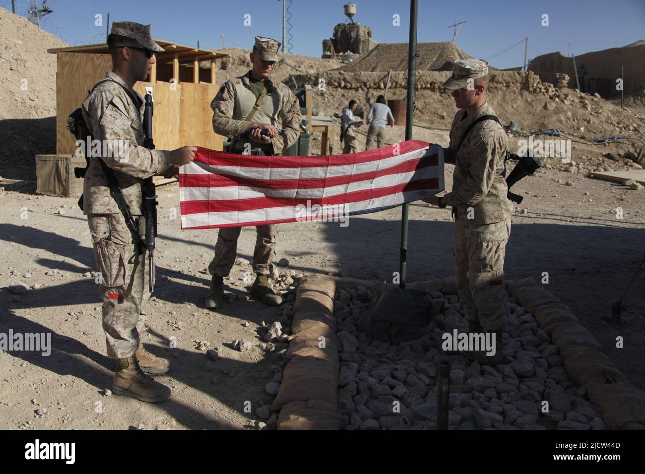 U.S. Marine Corps Sgt. James M. Mercure Jr. (center) with 1st Marine ...
