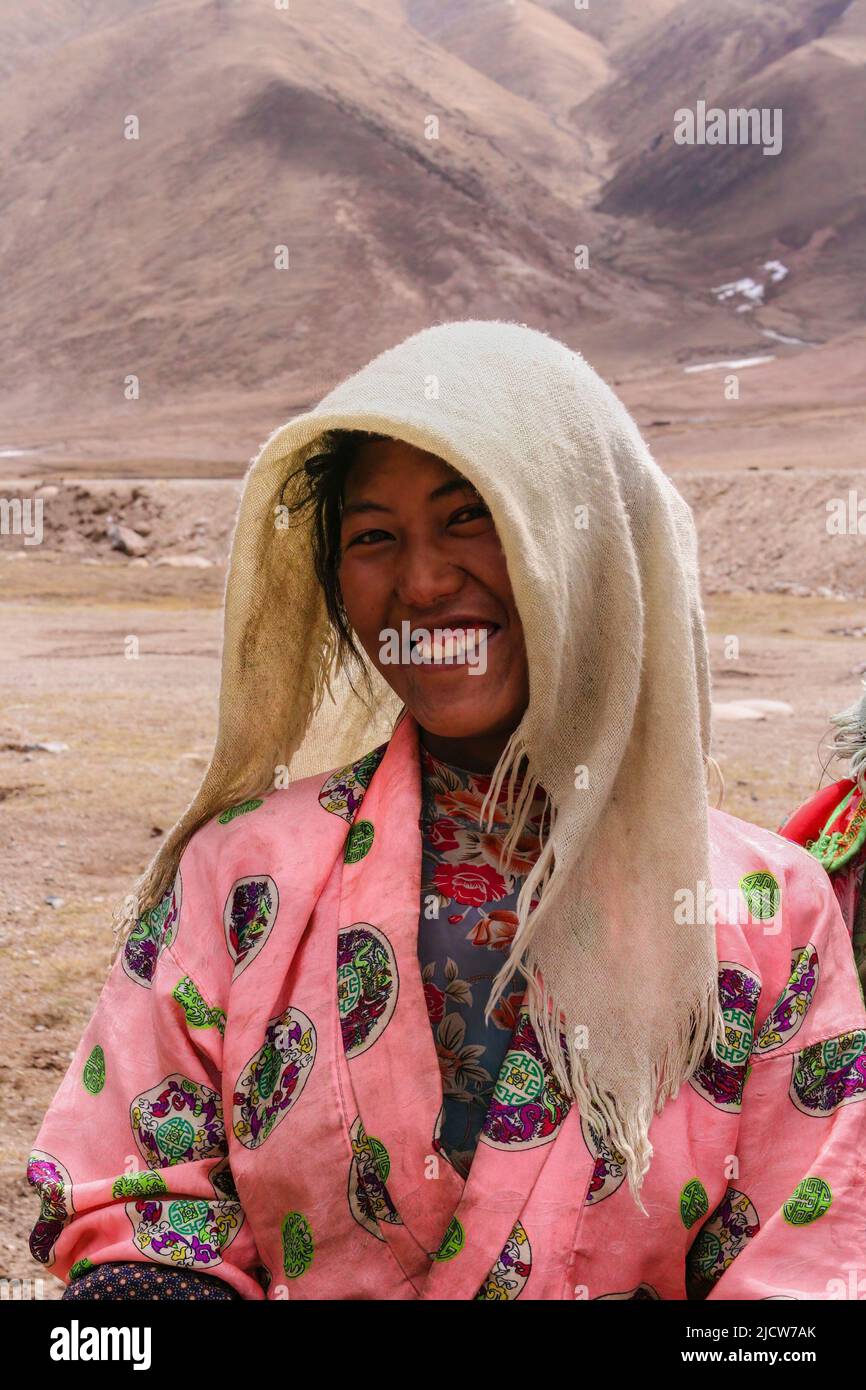 Tibetan woman chuba traditional dress hi-res stock photography and ...