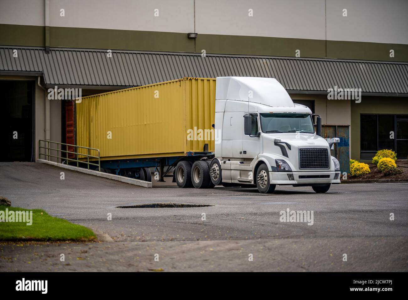 Big rig long haul professional high cab white semi truck with container ...