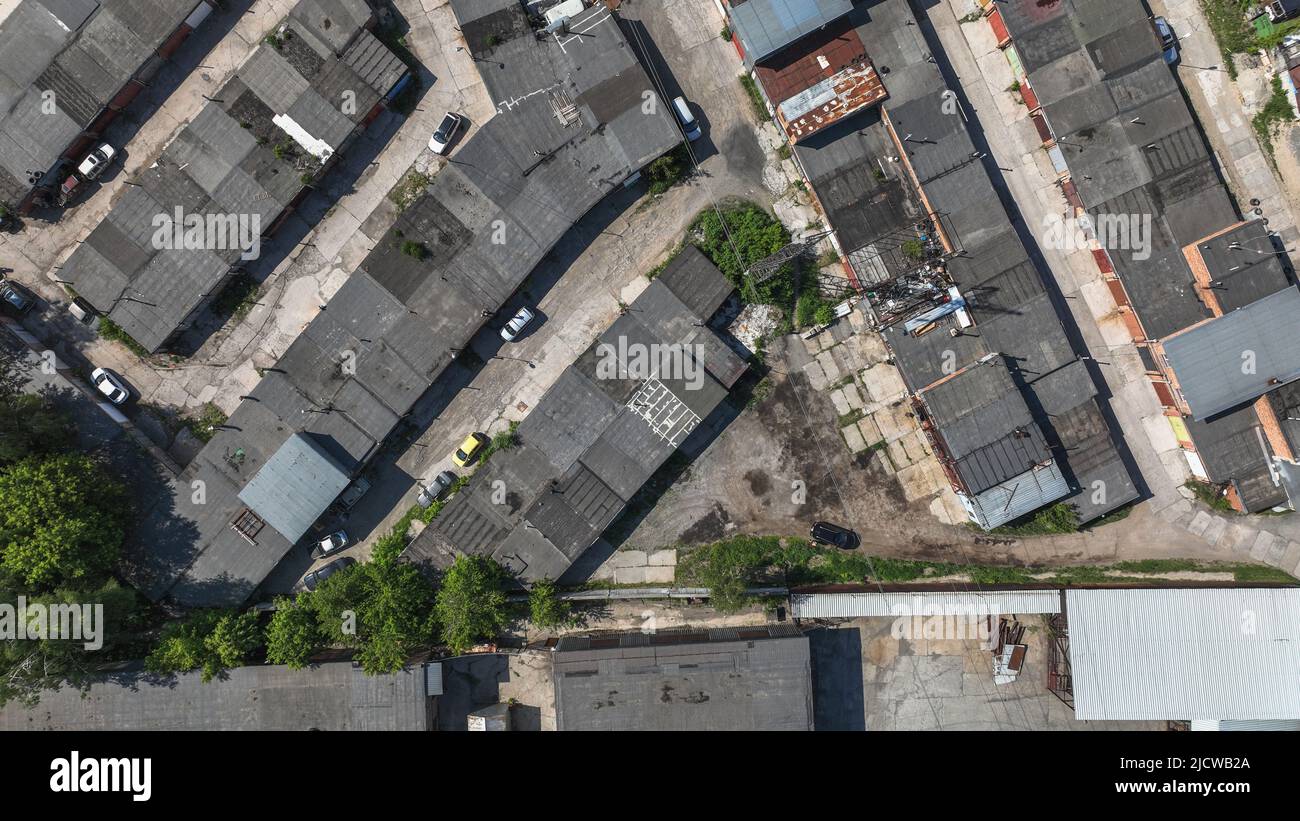 Warehouse roofs in summer. Many garages. Aerial view Stock Photo - Alamy
