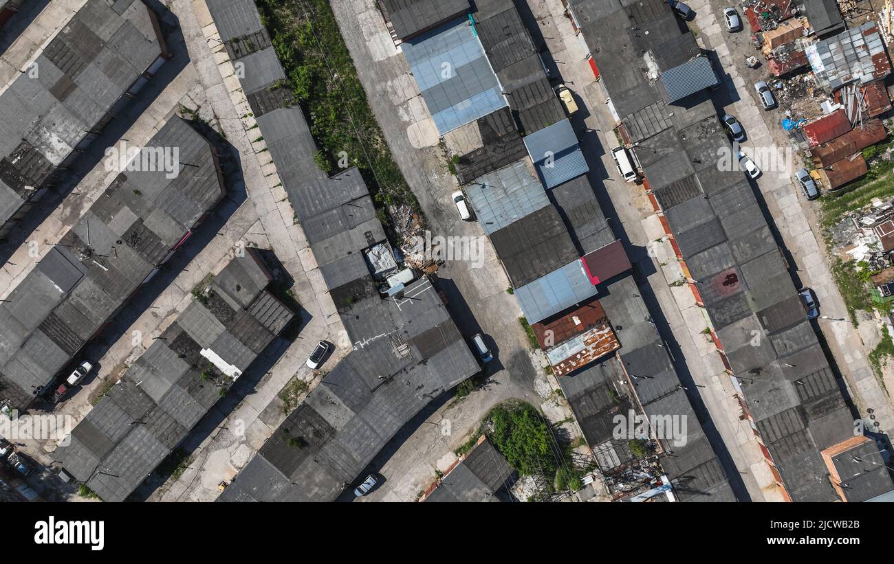 Warehouse roofs in summer. Many garages. Aerial view Stock Photo - Alamy