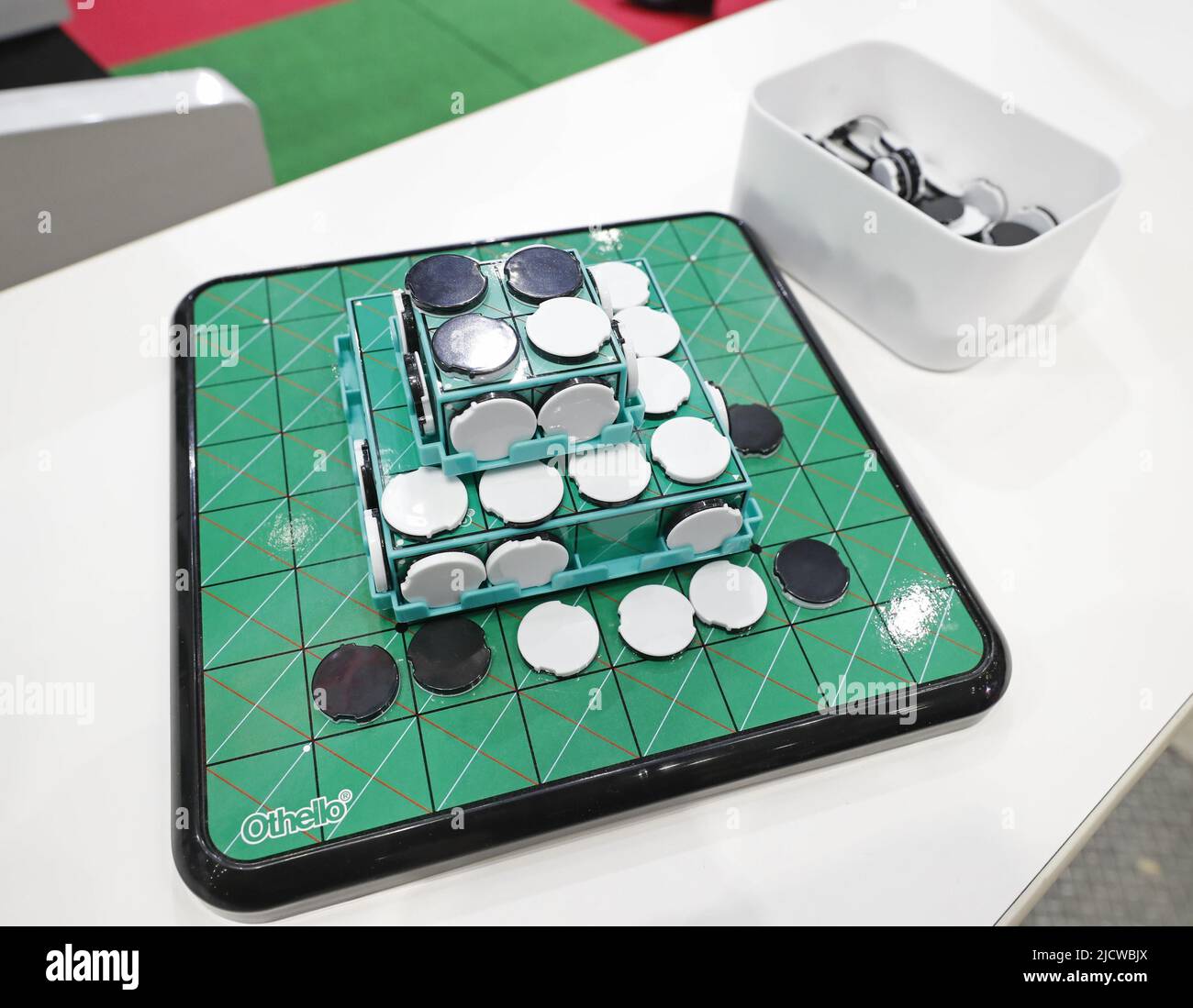 Photo taken June 16, 2022, shows the three-dimensional Reversi board ...