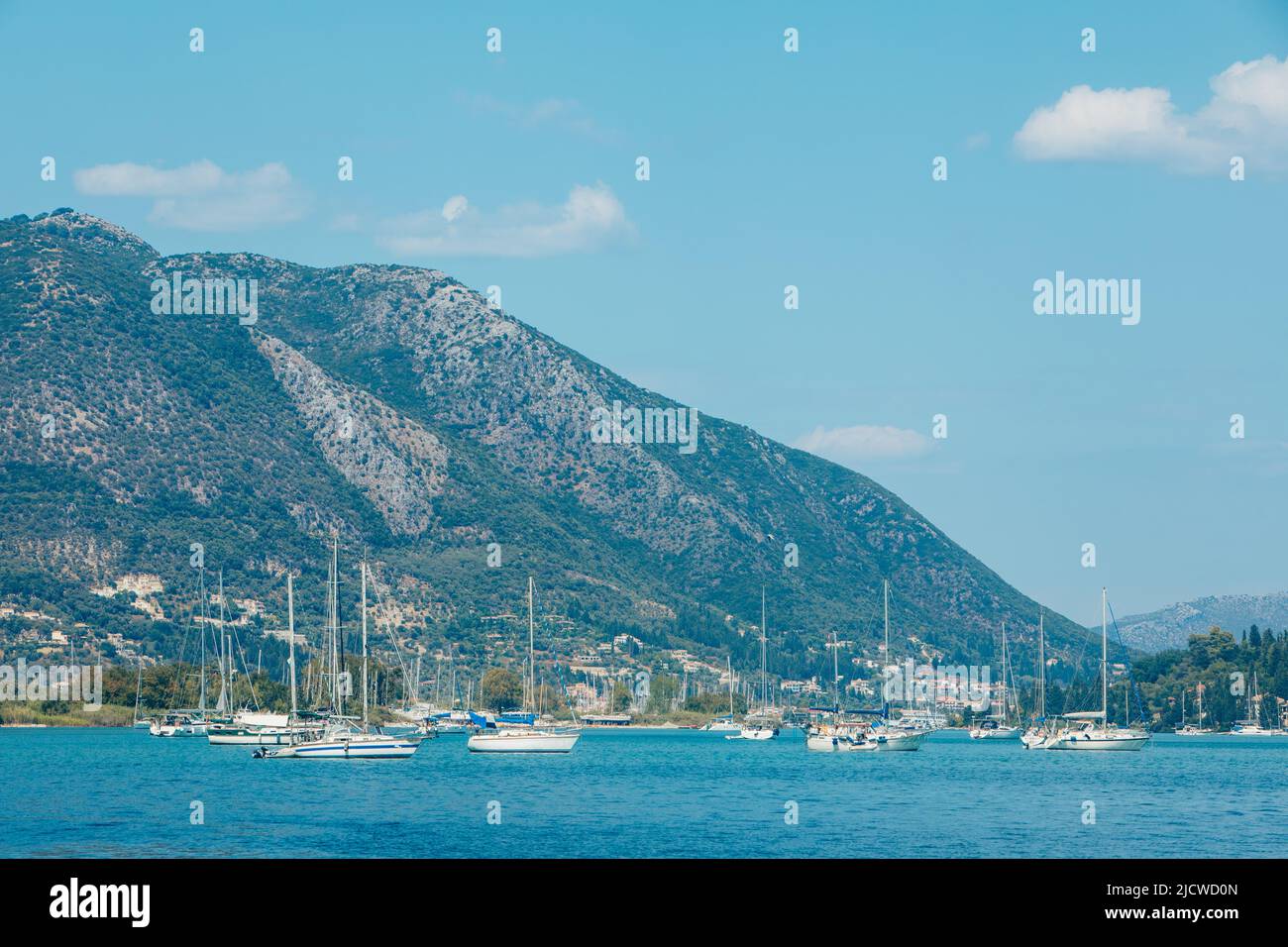 sea bay with yachts and boats at Lefkada island Greece mountains on ...