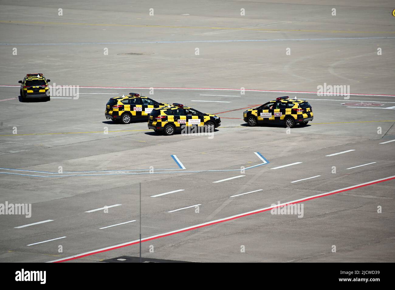 Cologne, Germany. 14th June, 2022. black yellow vehicles of the apron ...