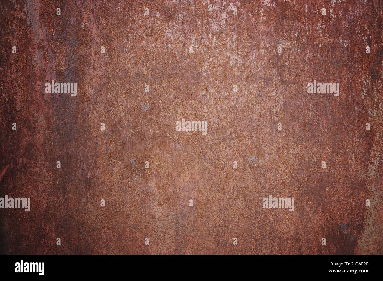 Rusty surface with old paint residue. Rusty metal surface as background ...