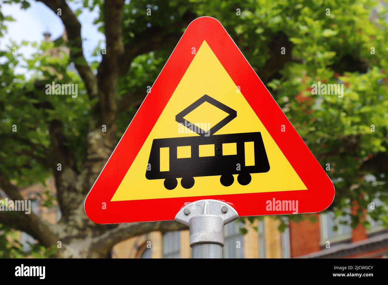 Close-up view of a beware of tram road sign Stock Photo - Alamy