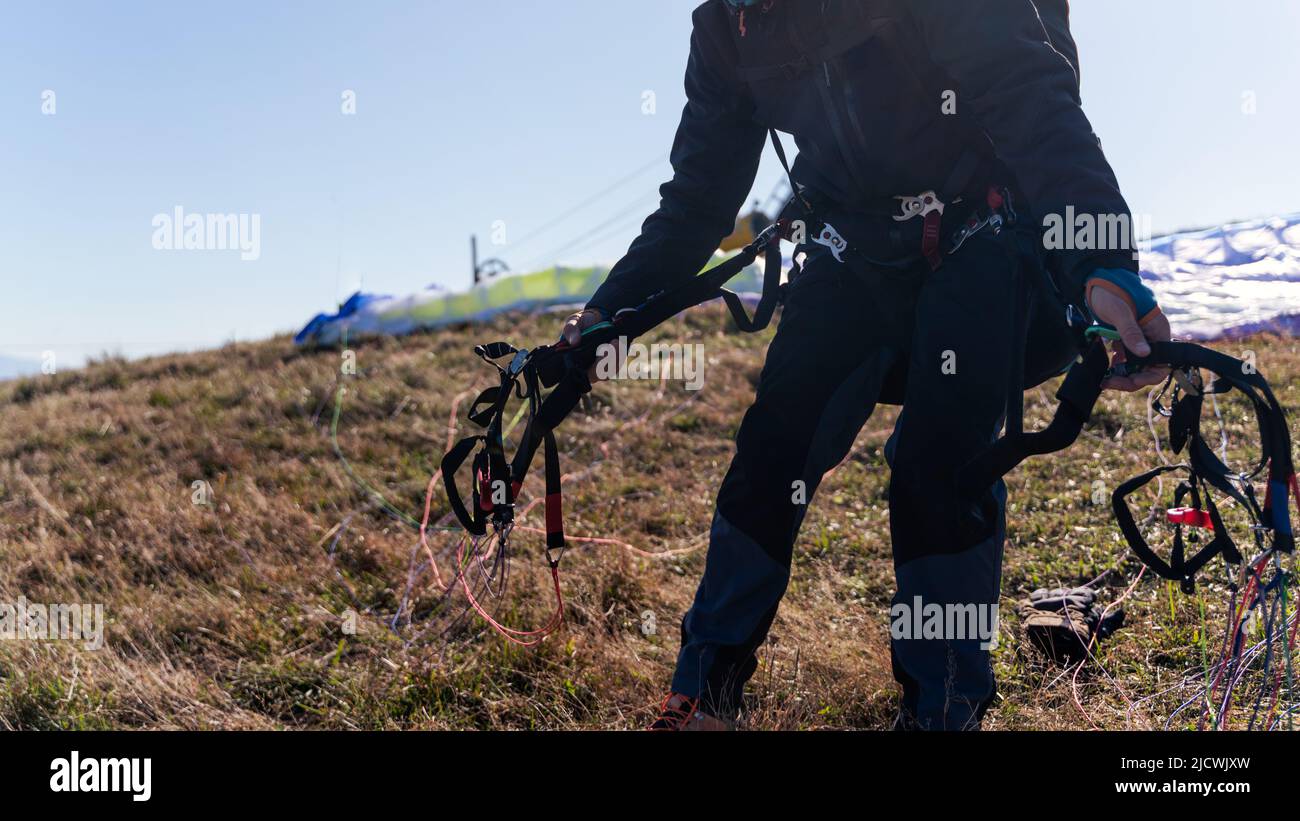 Unrecognizable paraglider preparing flight hi-res stock photography and ...